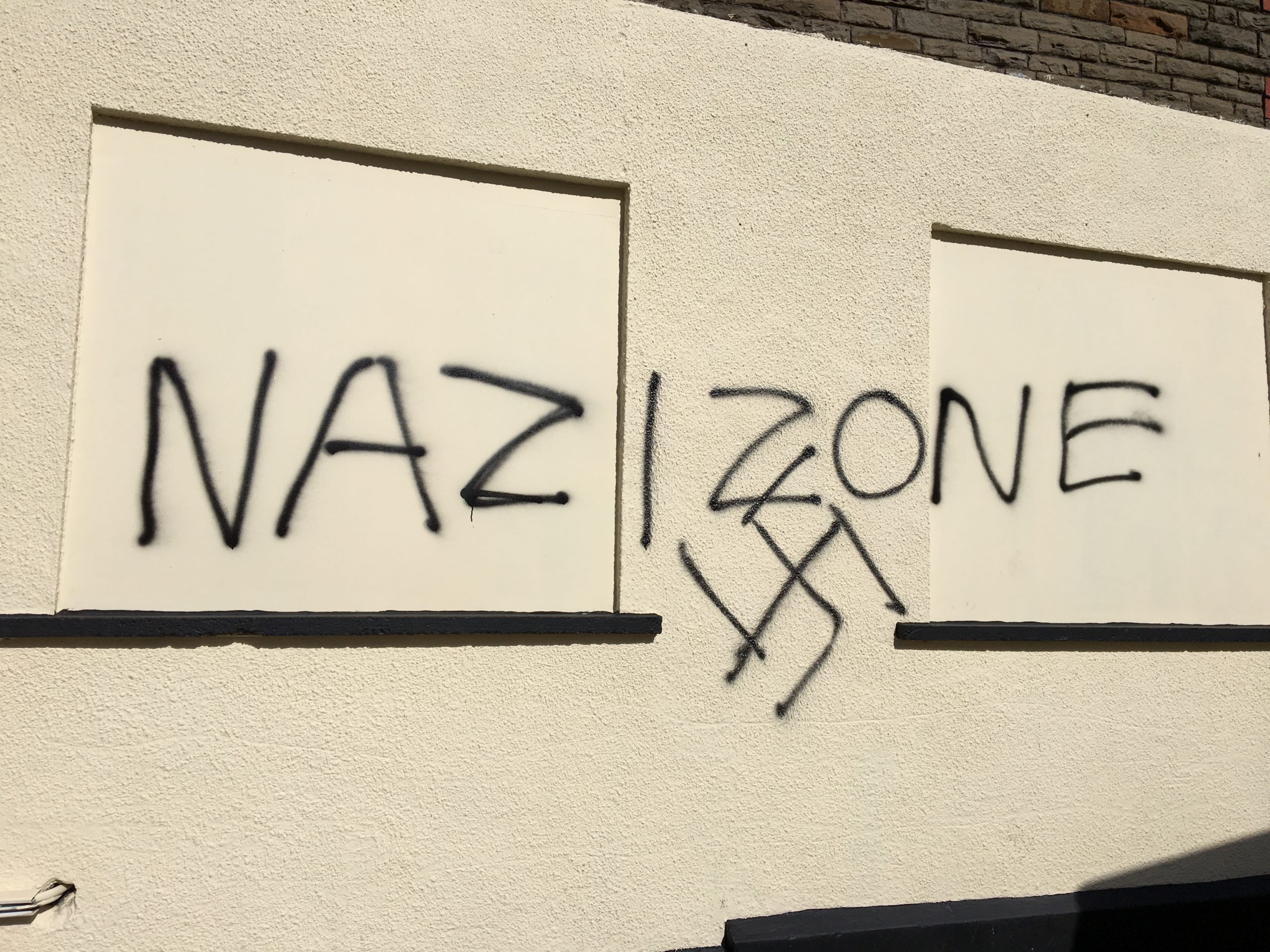 Nazi posters and swastikas stain route of anti-racism march - The ...